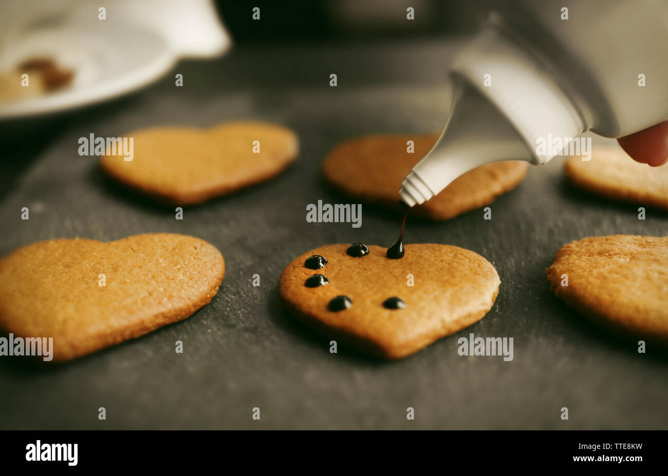 Cookies decorating process Stock Photo - Alamy