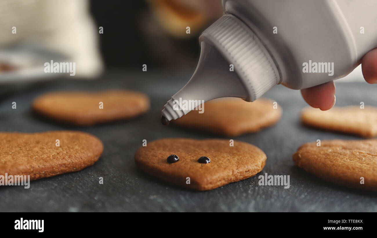 Cookies decorating process Stock Photo - Alamy