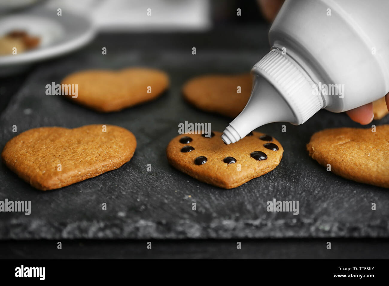 Cookies decorating process Stock Photo - Alamy