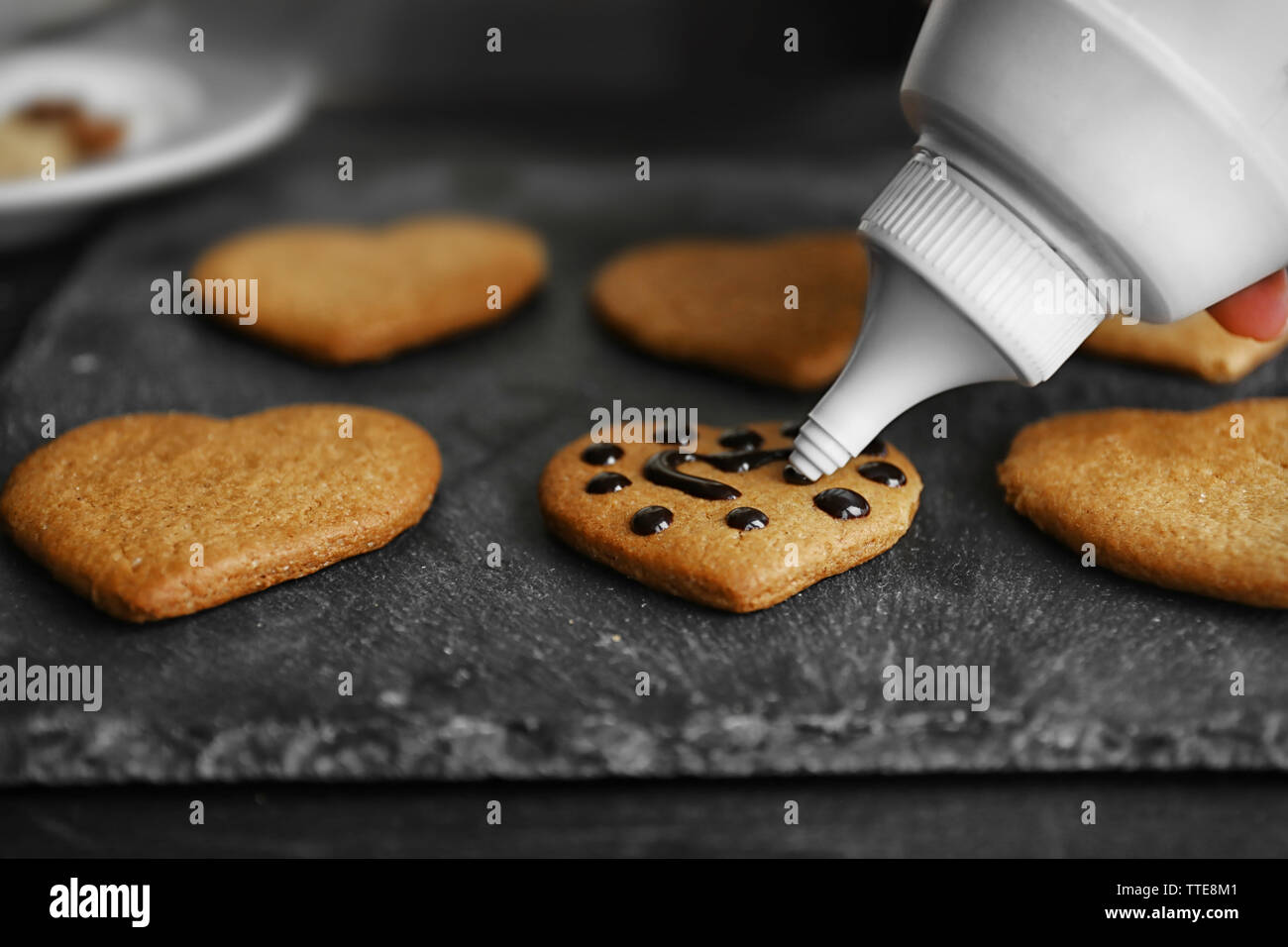 Cookies decorating process Stock Photo - Alamy