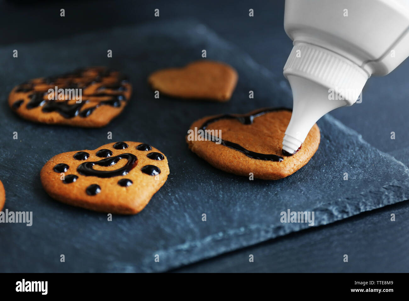 Cookies decorating process Stock Photo - Alamy