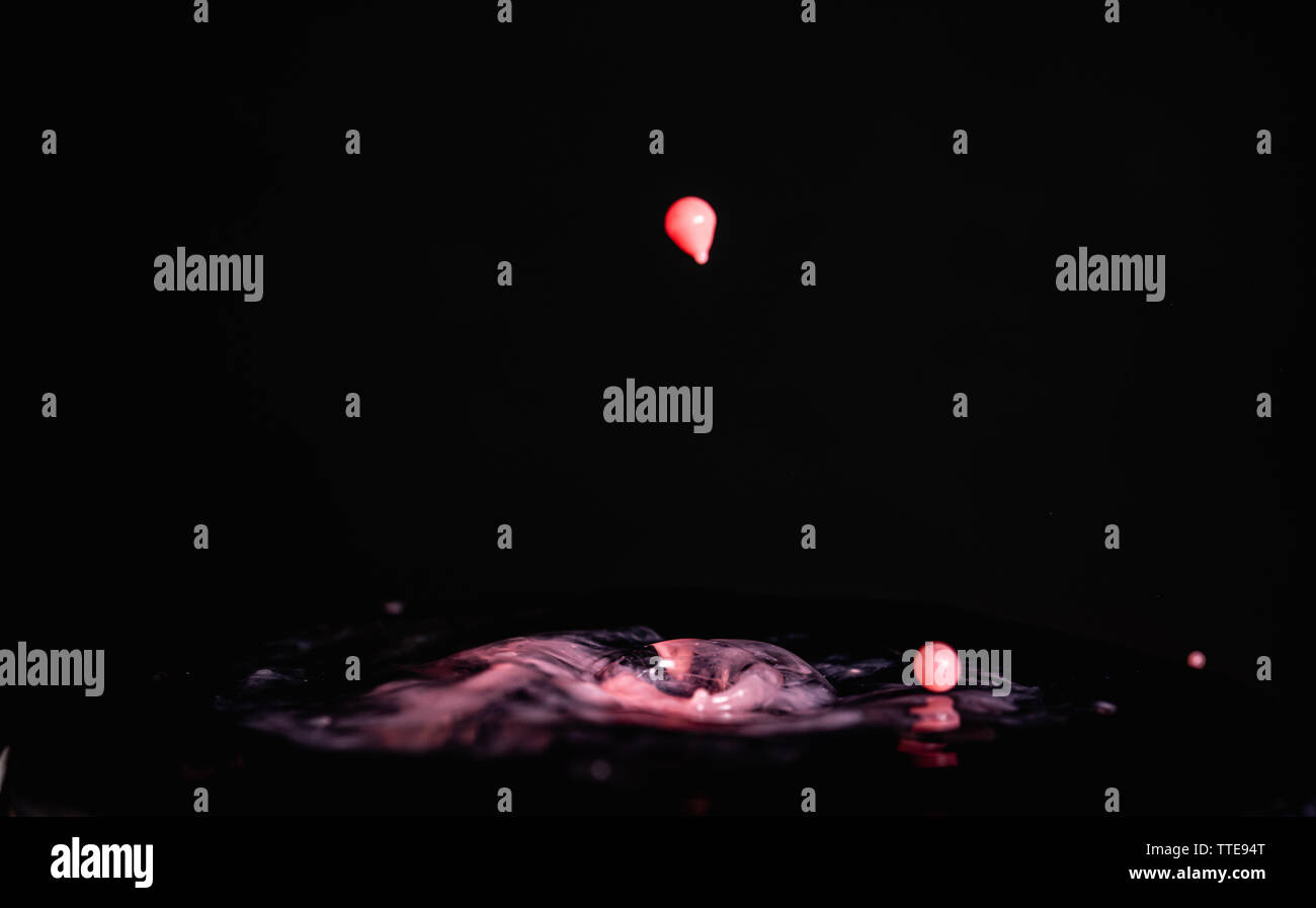 Splash of milk droplets in close up macro high resolution isolated ...