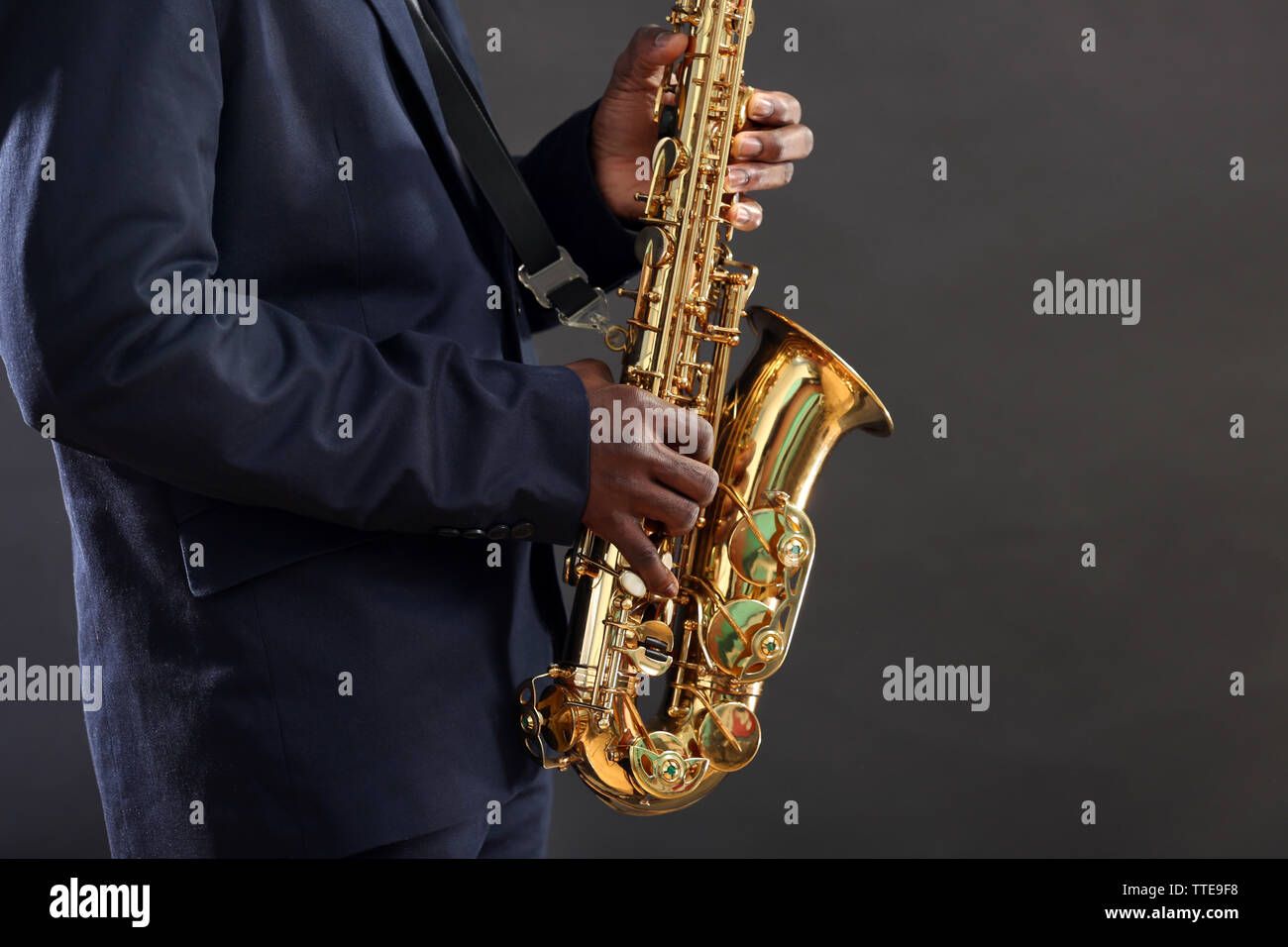 African American jazz musician playing the saxophone Stock Photo - Alamy