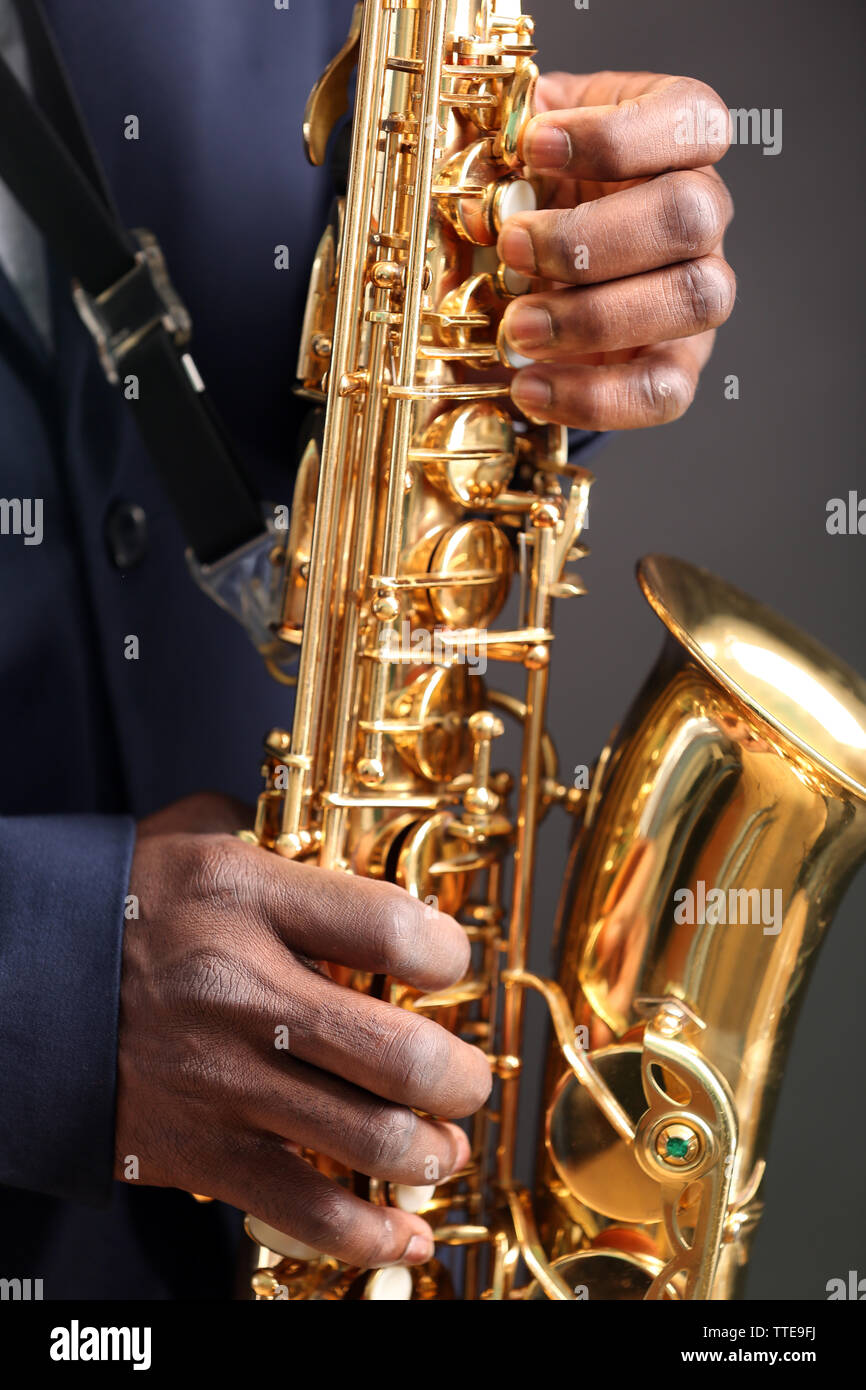 African American jazz musician playing the saxophone, closeup Stock ...