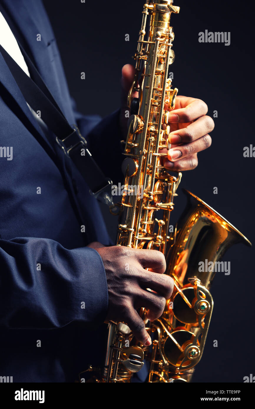 African American jazz musician playing the saxophone, closeup Stock ...