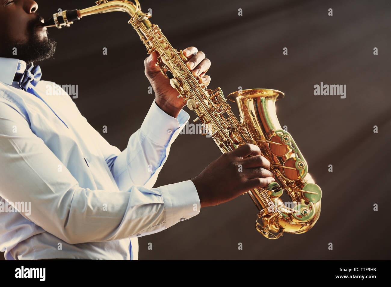 African American jazz musician playing the saxophone, closeup Stock ...