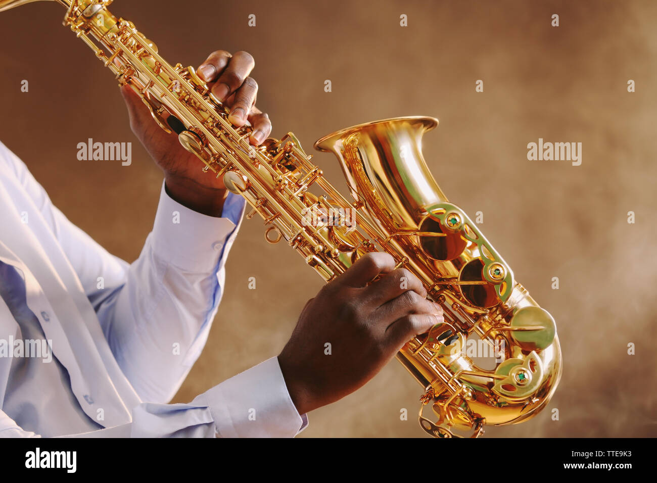 African American jazz musician playing the saxophone, closeup Stock ...