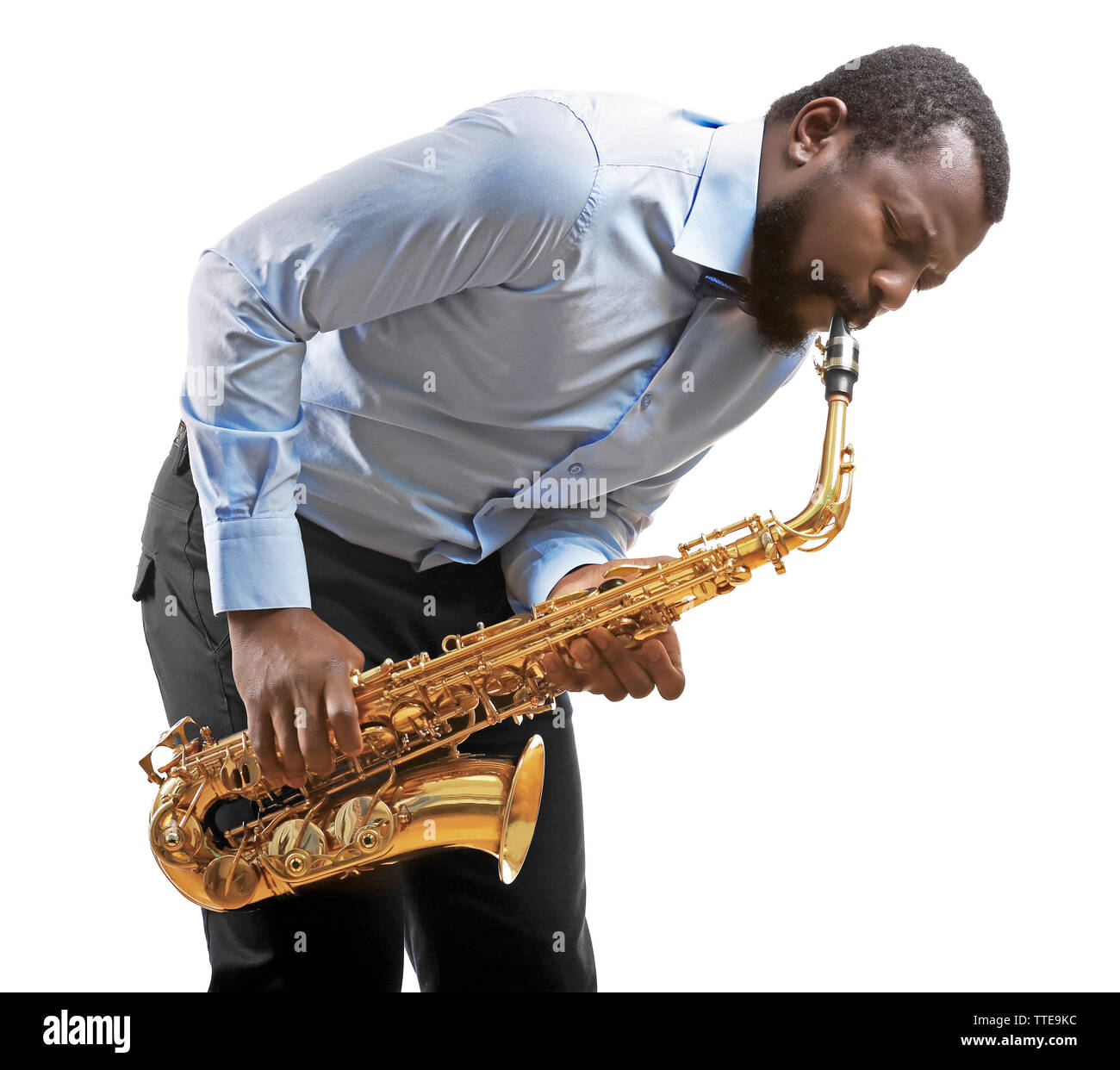 African American jazz musician playing the saxophone, isolated on white ...