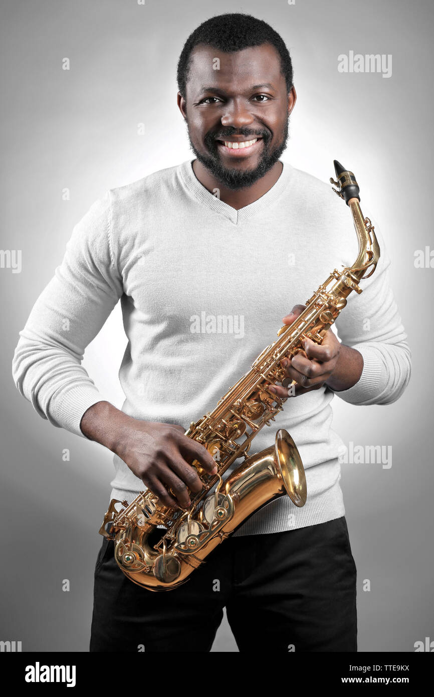 African American jazz musician playing the saxophone Stock Photo - Alamy