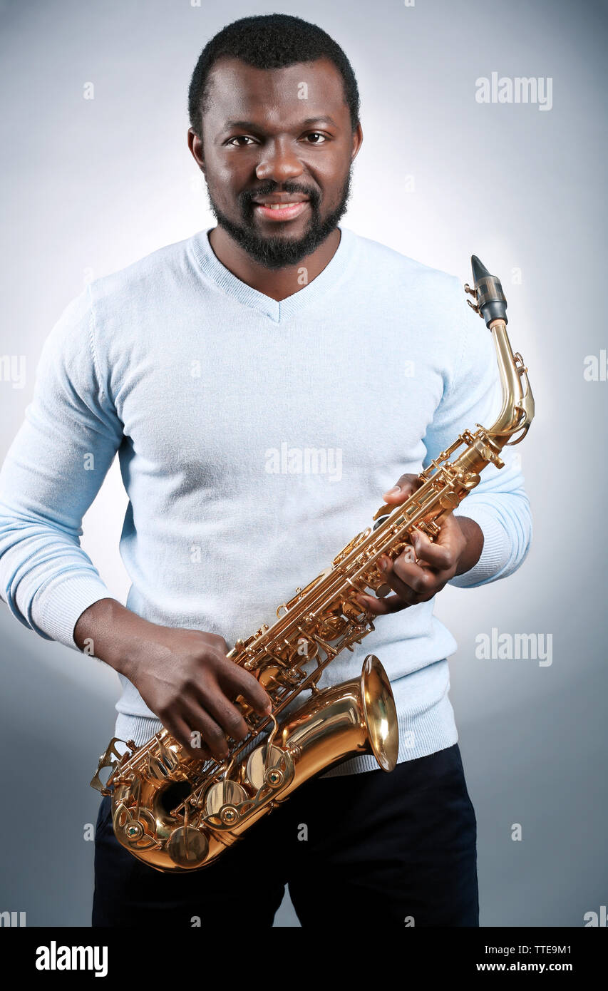African American jazz musician playing the saxophone Stock Photo - Alamy