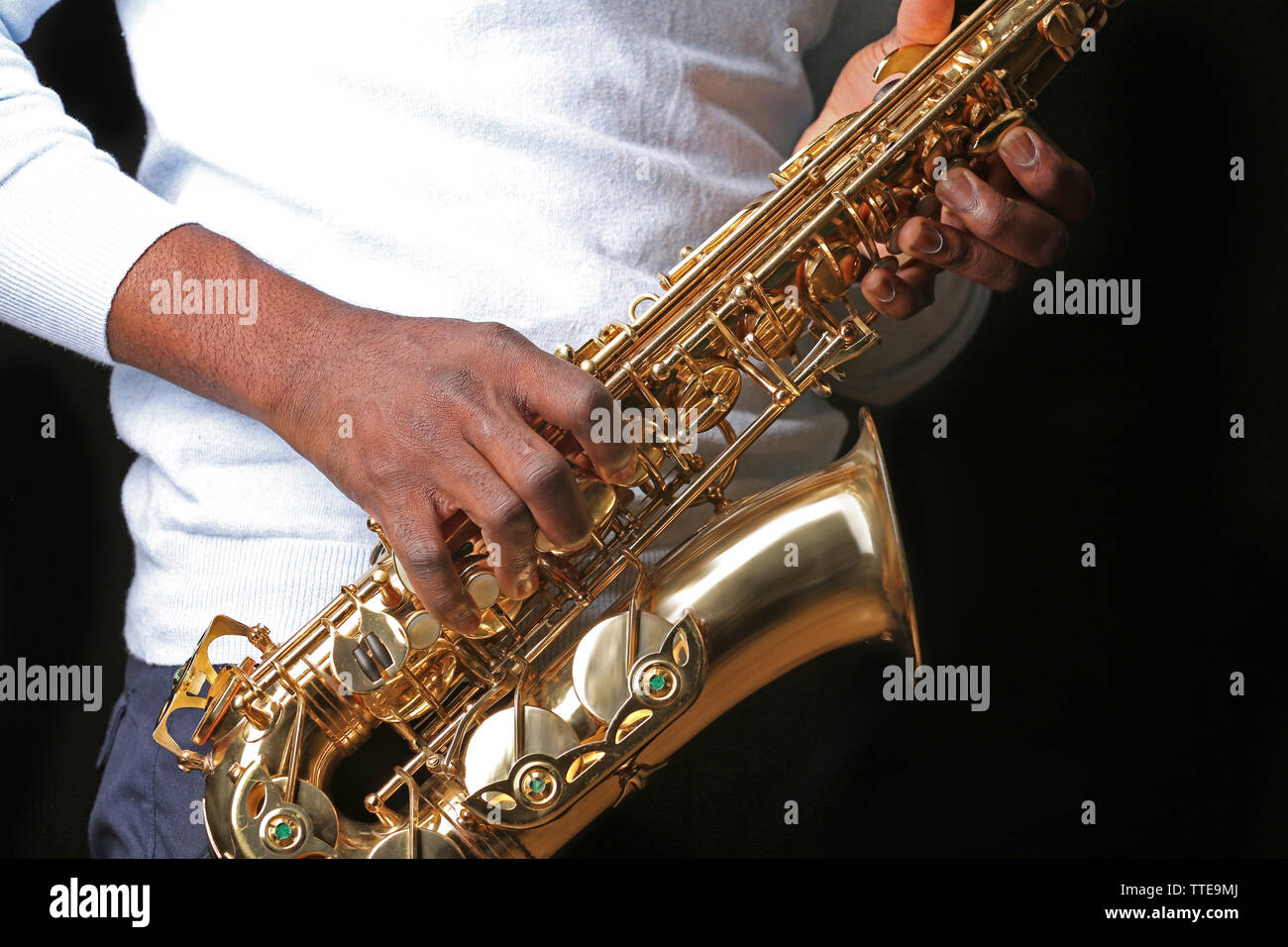 African American jazz musician playing the saxophone, closeup Stock ...