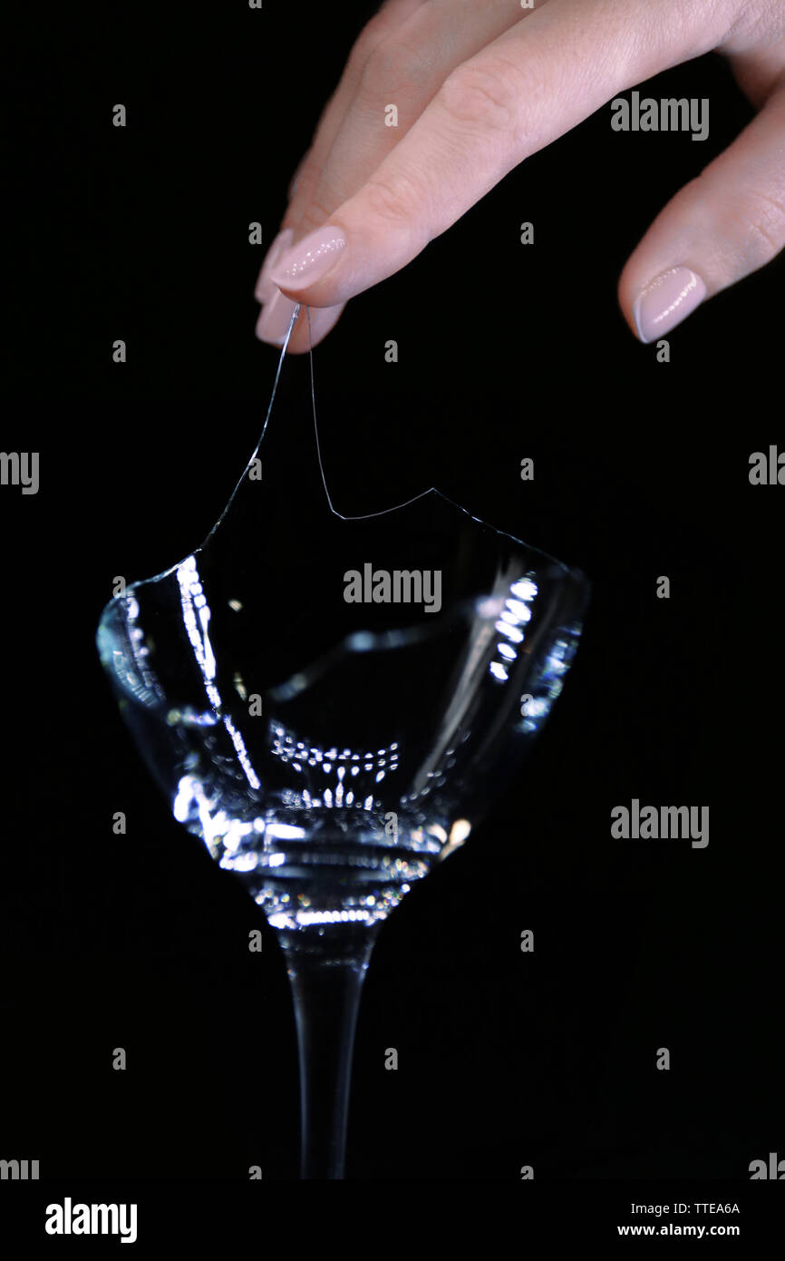 Hand and broken wine glass hi-res stock photography and images - Alamy