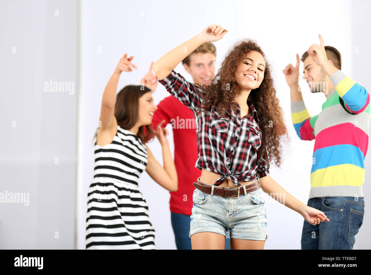 Teenager girl dancing with her friends Stock Photo - Alamy