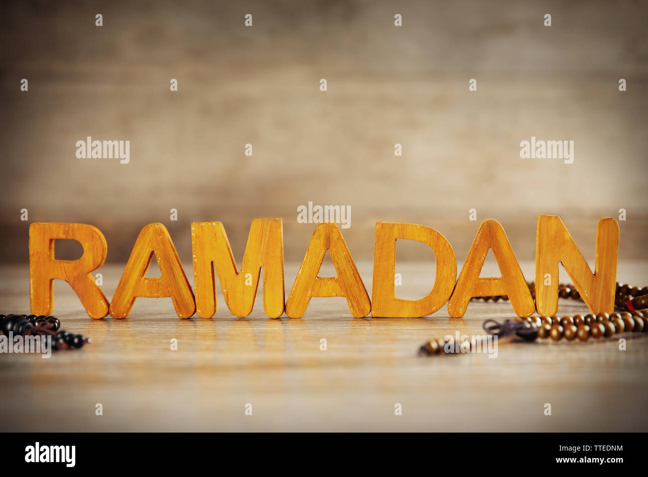 Ramadan word with wooden letters and rosary on table Stock Photo - Alamy
