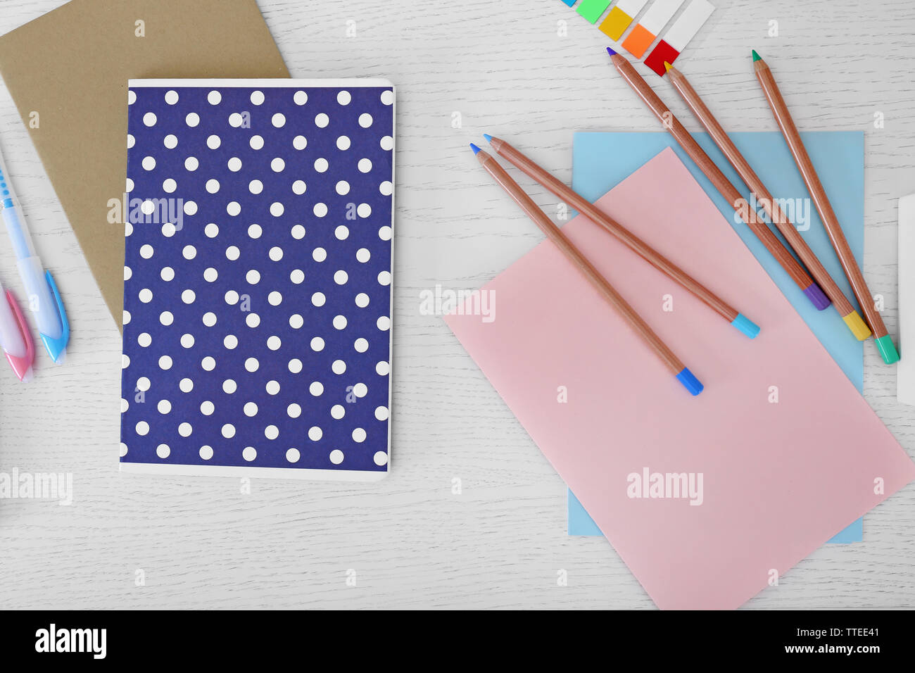 Office and school set with stationery and notebooks on a table Stock ...