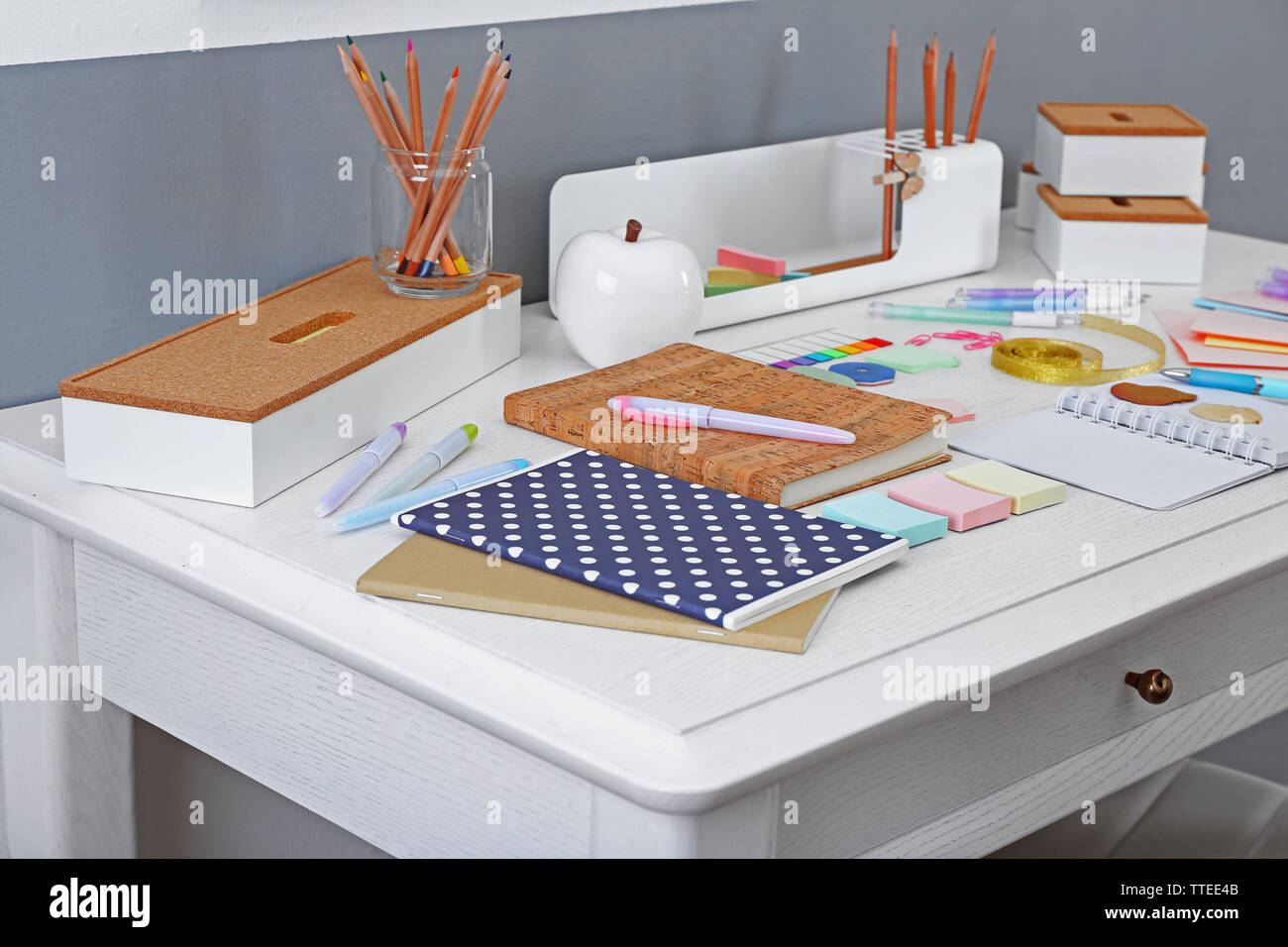 Office and school set with stationery and notebooks on a table Stock ...
