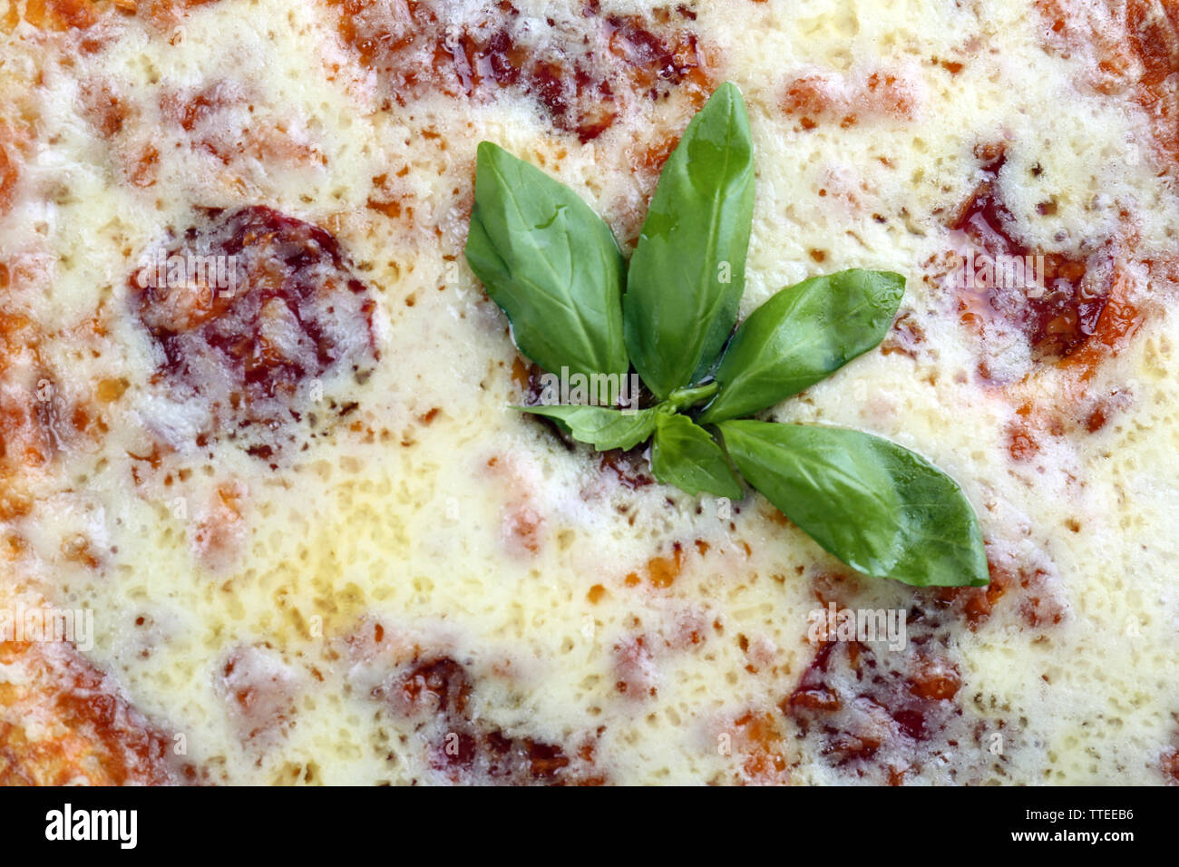 Delicious tasty pizza, closeup Stock Photo - Alamy