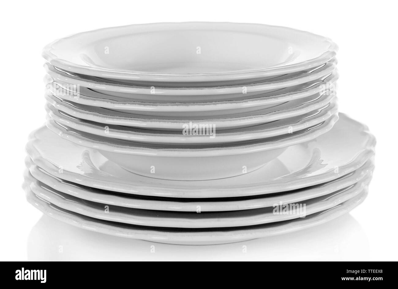 Stack of plates, isolated on white Stock Photo - Alamy