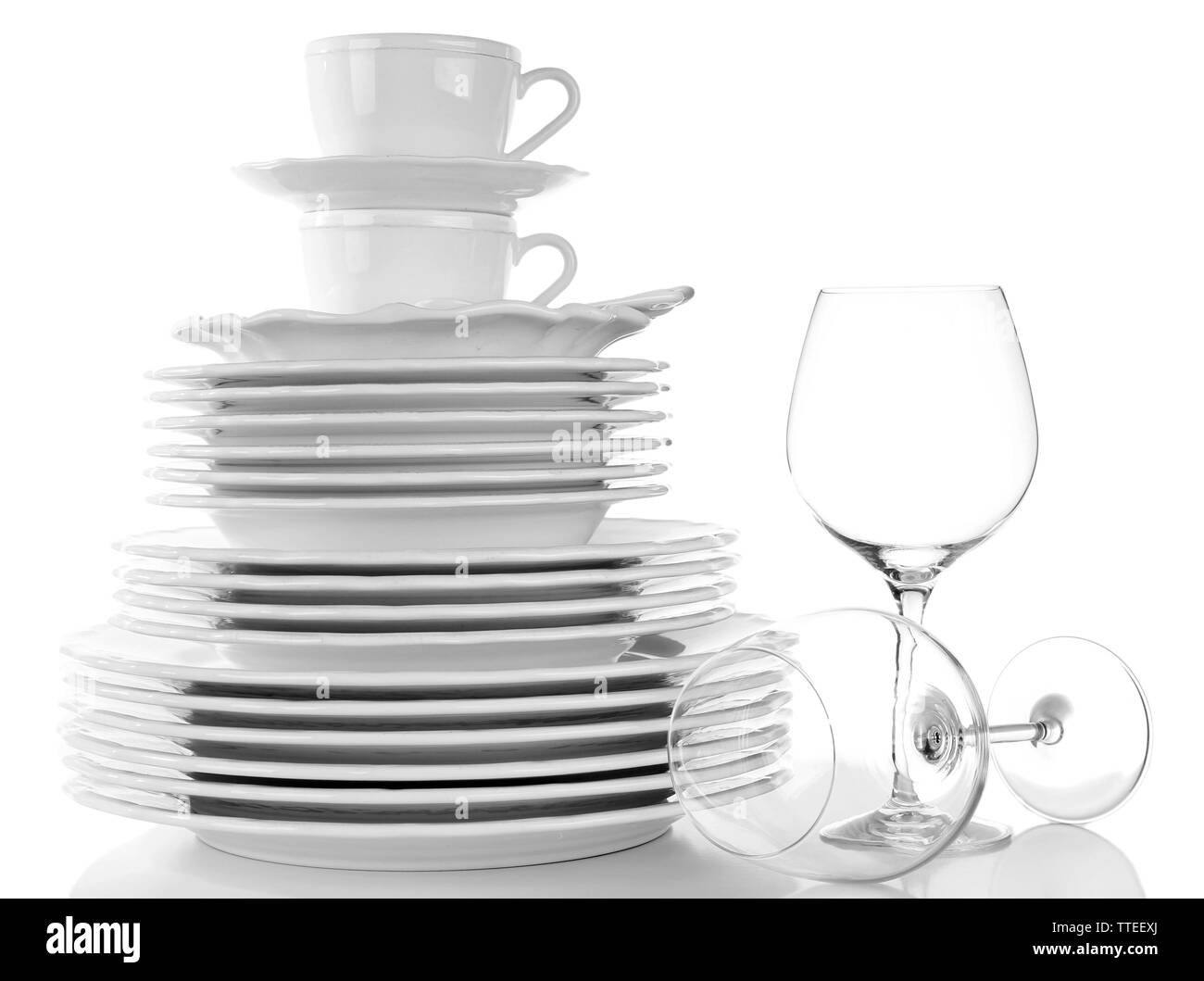 Woman wiping the dishes on white background Stock Photo - Alamy