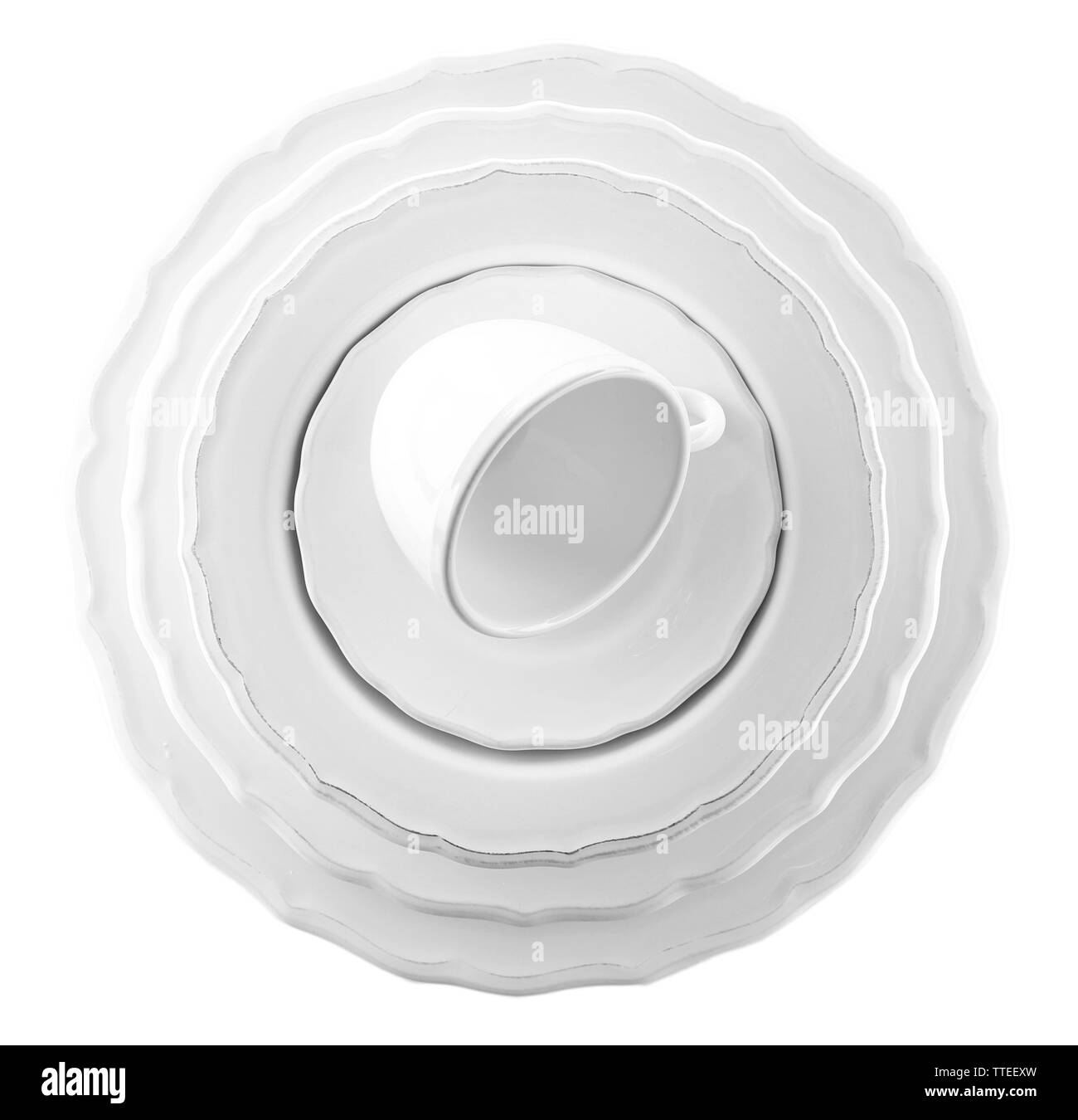 Stack of plates with cup, isolated on white Stock Photo - Alamy