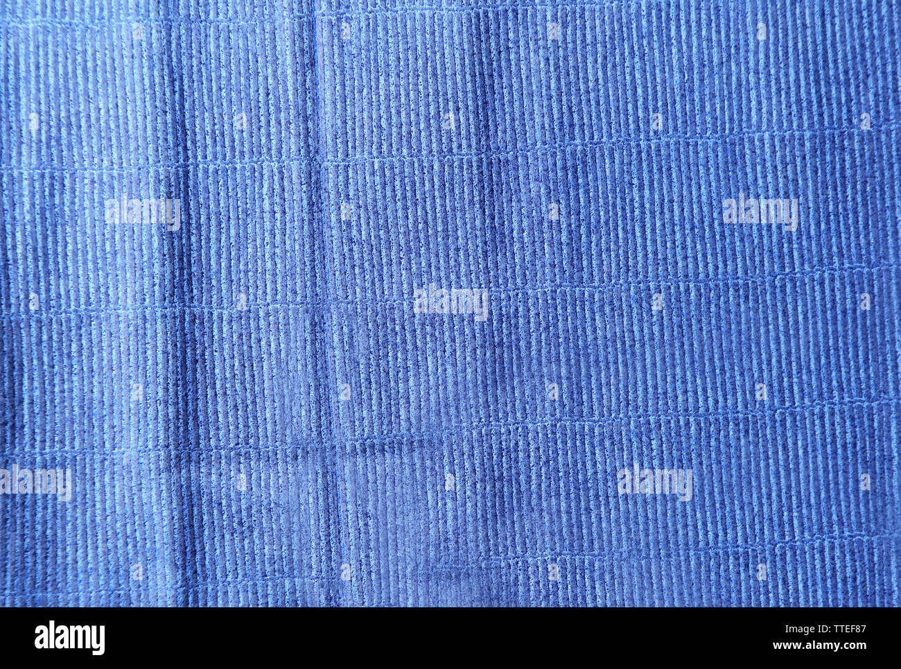 Blue cloth texture with uneven crumpled surface Stock Photo - Alamy
