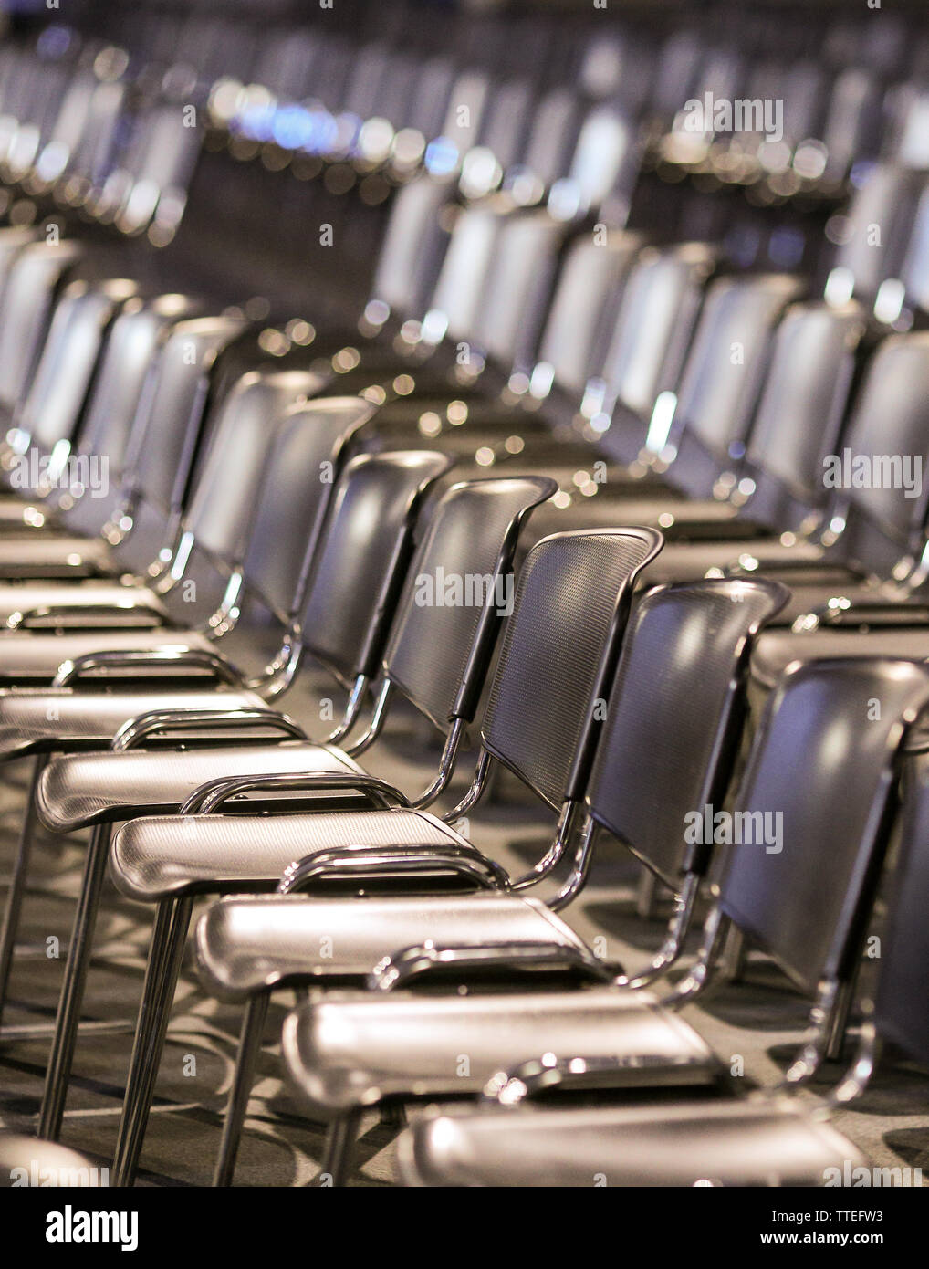 Rows of empty plastic seats in an empty conference room - no people ...