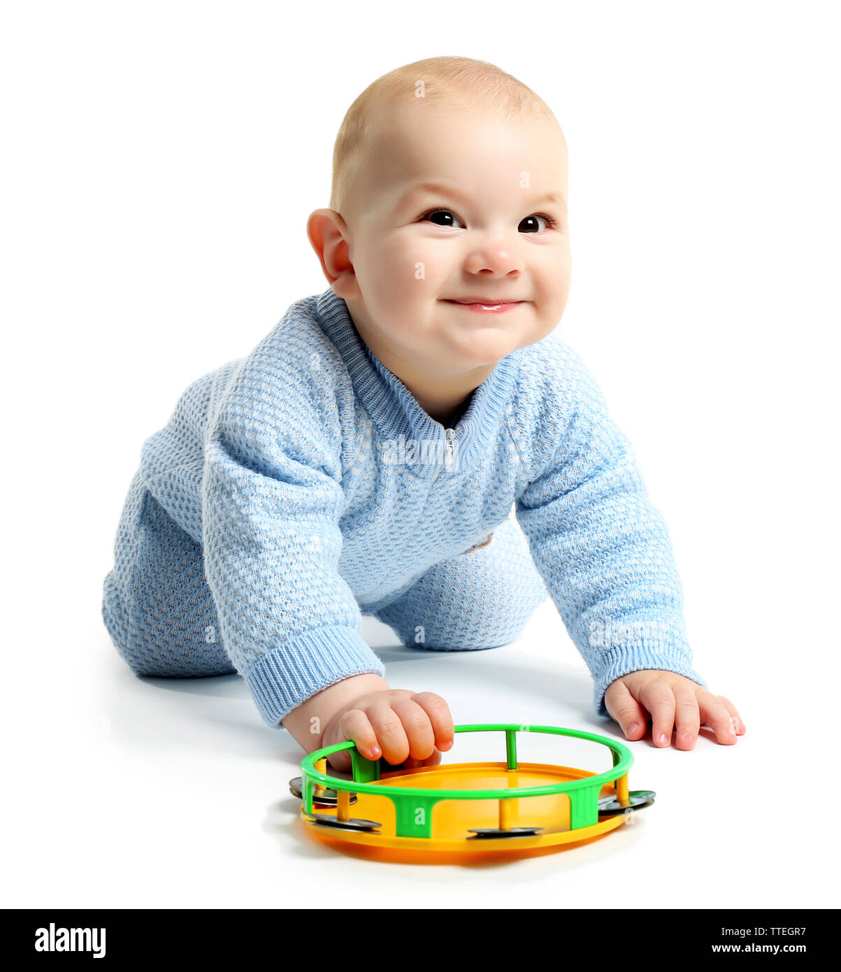 Adorable baby with plastic colourful tambourine isolated on white ...