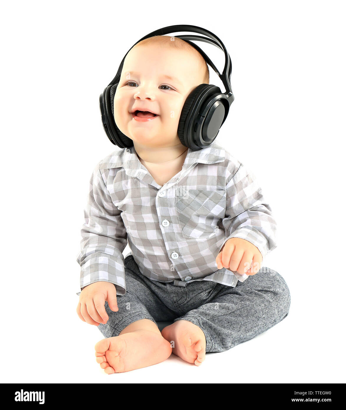 Cute baby with headphones isolated on white background Stock Photo - Alamy