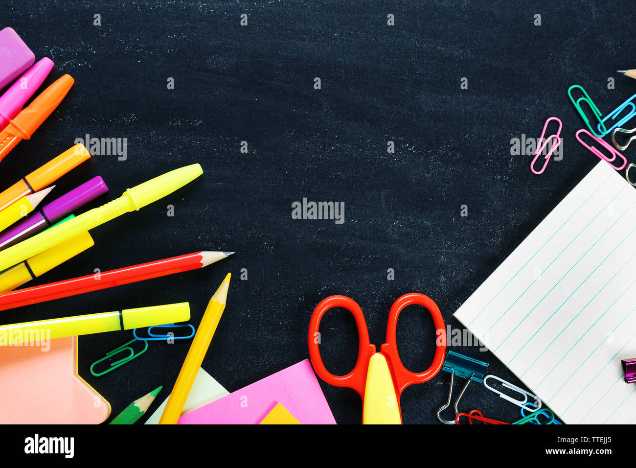 Frame of stationery on black background Stock Photo - Alamy