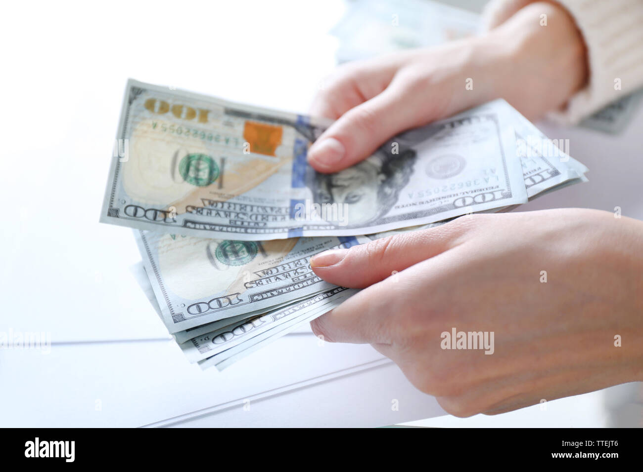 Hands counting money, close up Stock Photo - Alamy