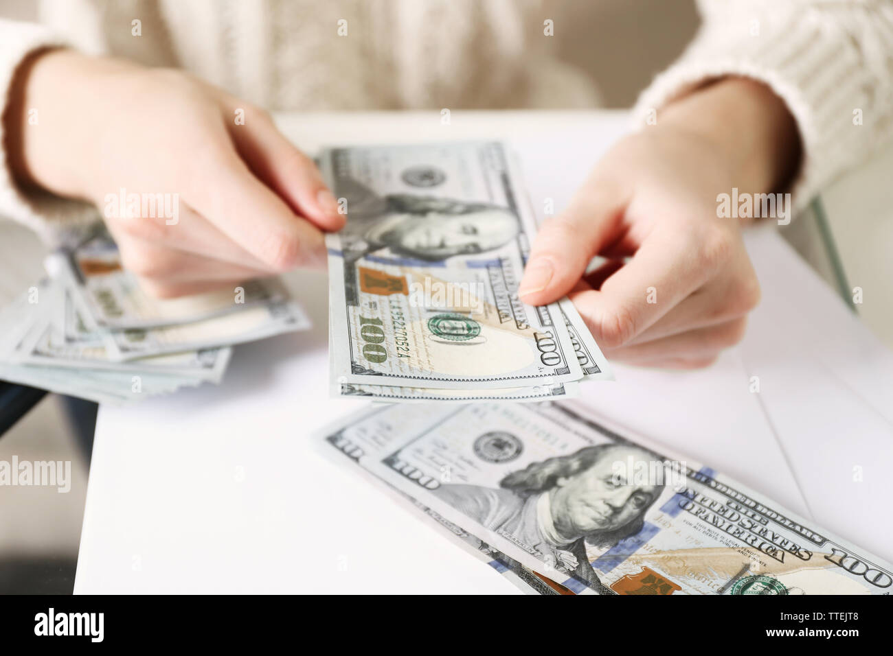 Hands counting money, close up Stock Photo - Alamy