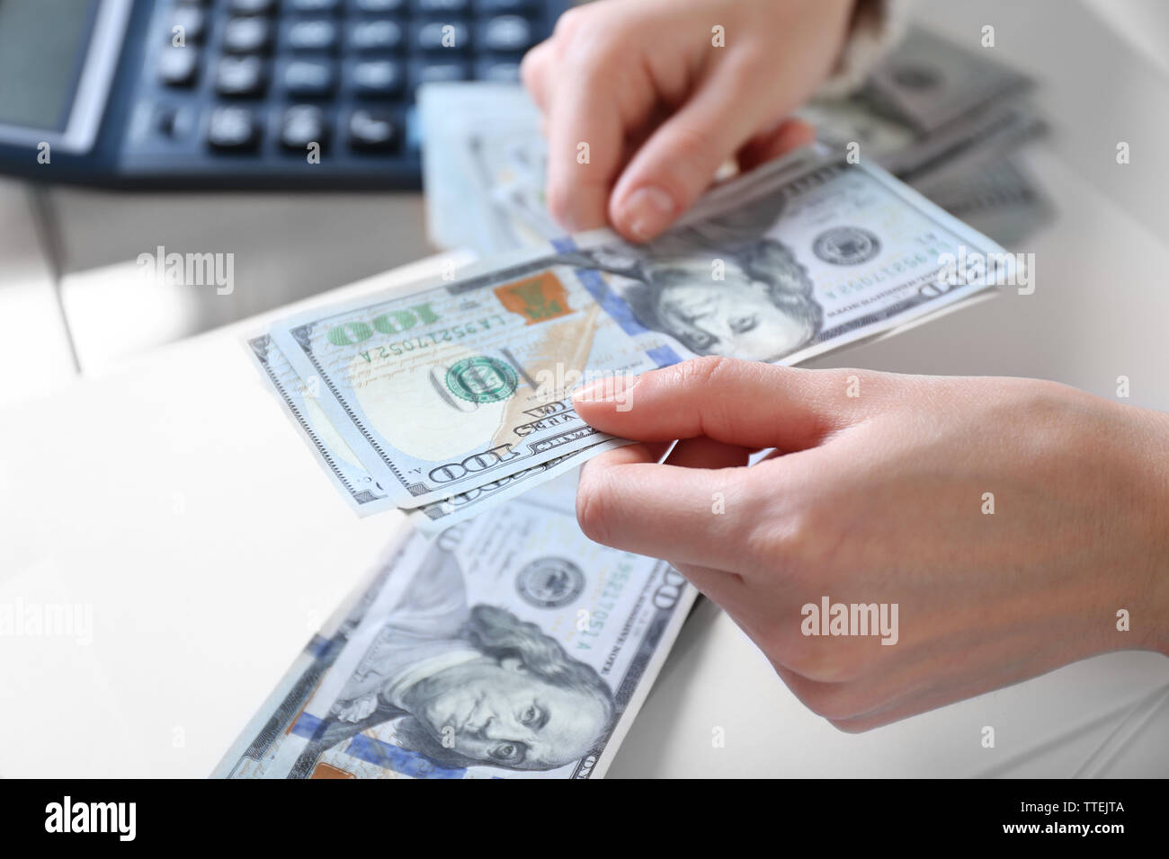 Hands counting money, close up Stock Photo - Alamy