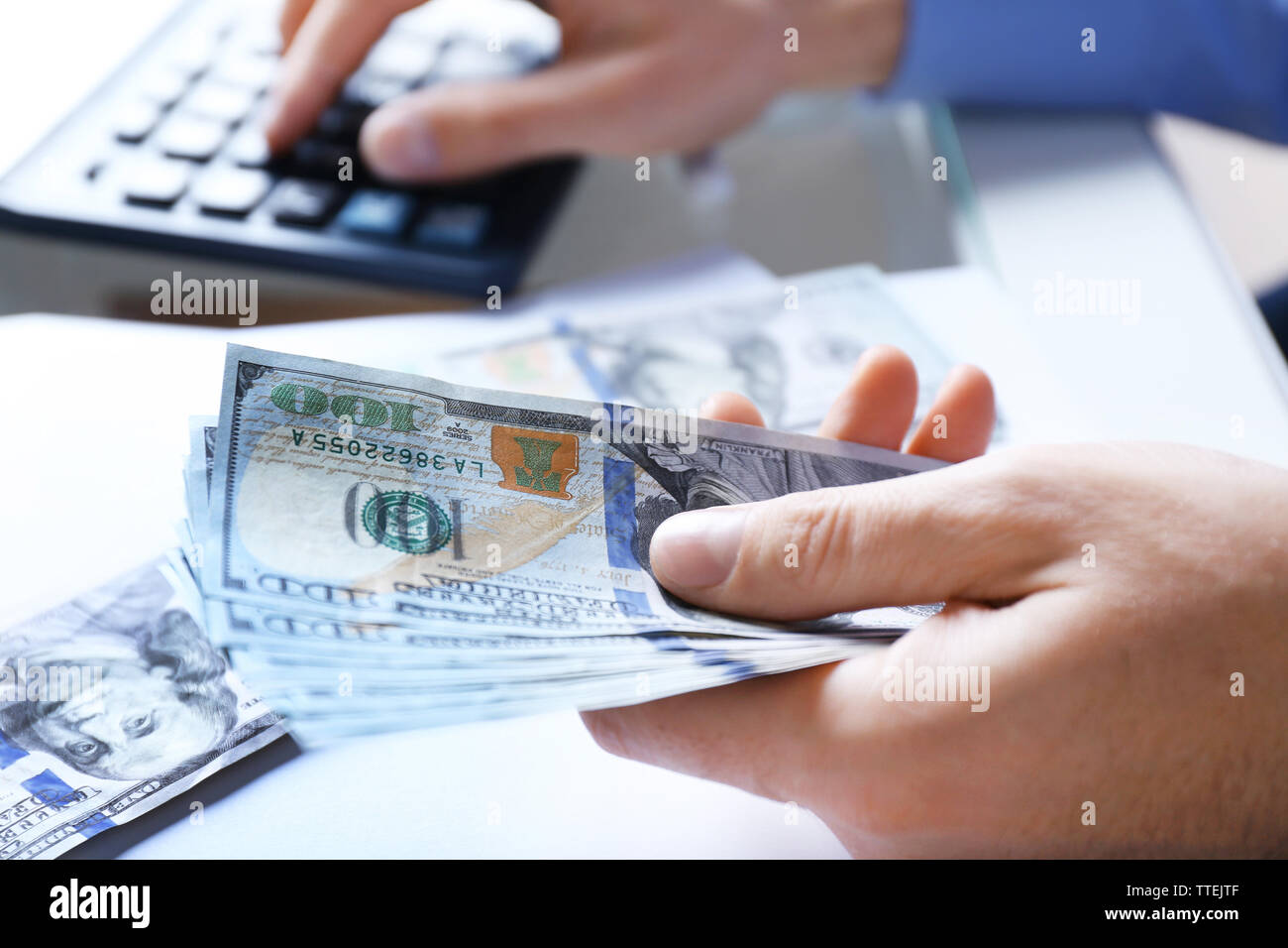 Hands counting money, close up Stock Photo - Alamy