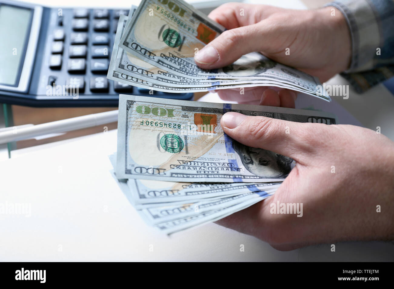 Hands counting money, close up Stock Photo - Alamy