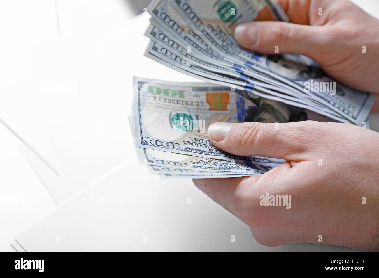 Hands counting money, close up Stock Photo - Alamy