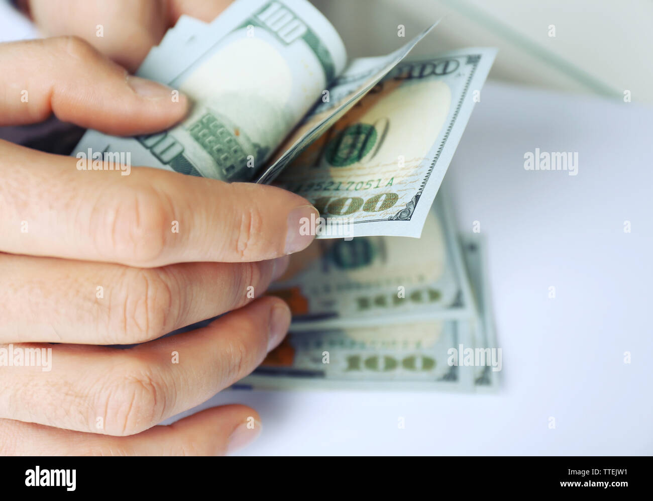 Hands counting money, close up Stock Photo - Alamy