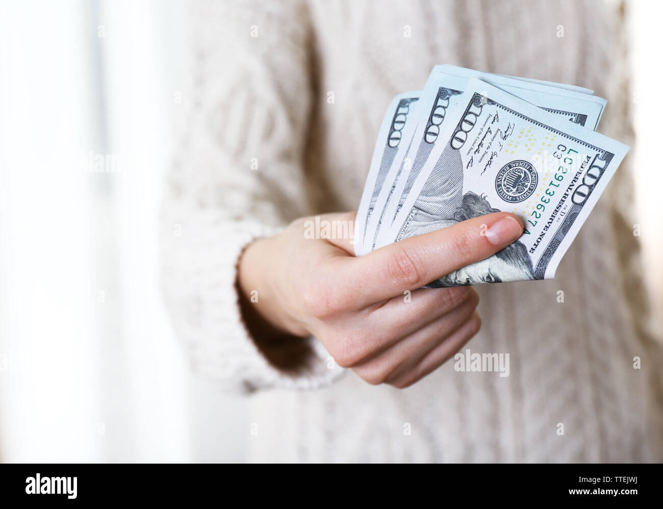 Hand holds money, close up Stock Photo - Alamy