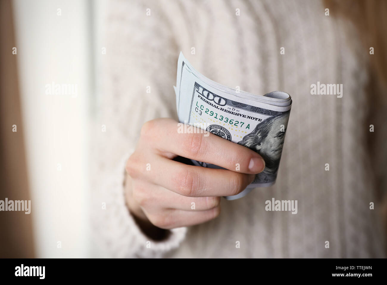 Hand holds money, close up Stock Photo - Alamy