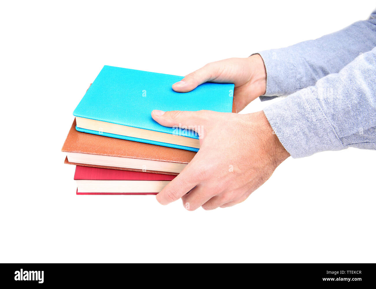 Man hands holding books, isolated on white Stock Photo - Alamy