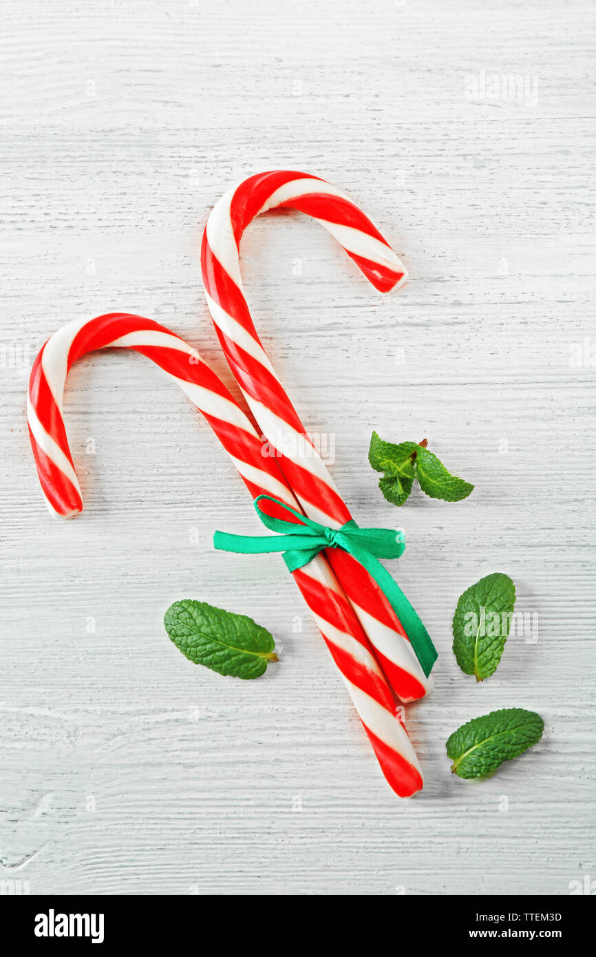 Lollipop candies with mint and stripe on light background Stock Photo ...