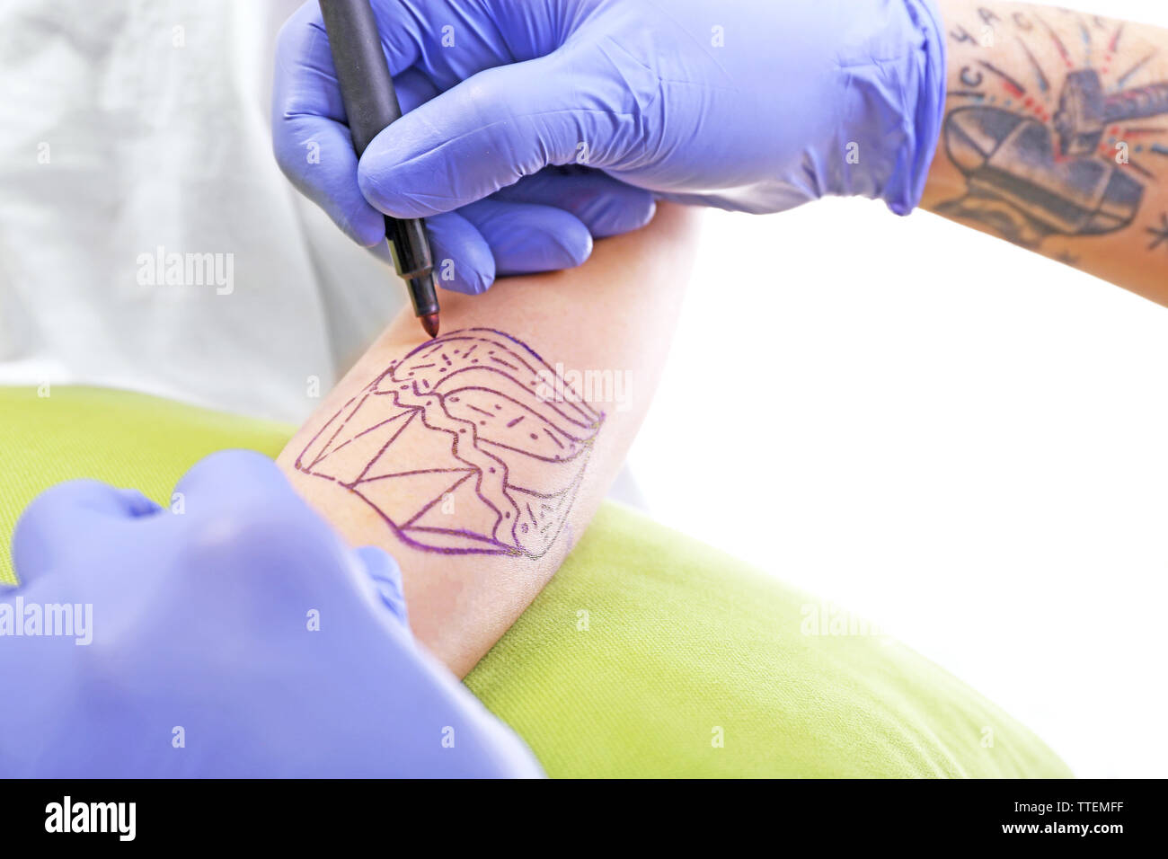 Process of making tattoo, closeup Stock Photo - Alamy