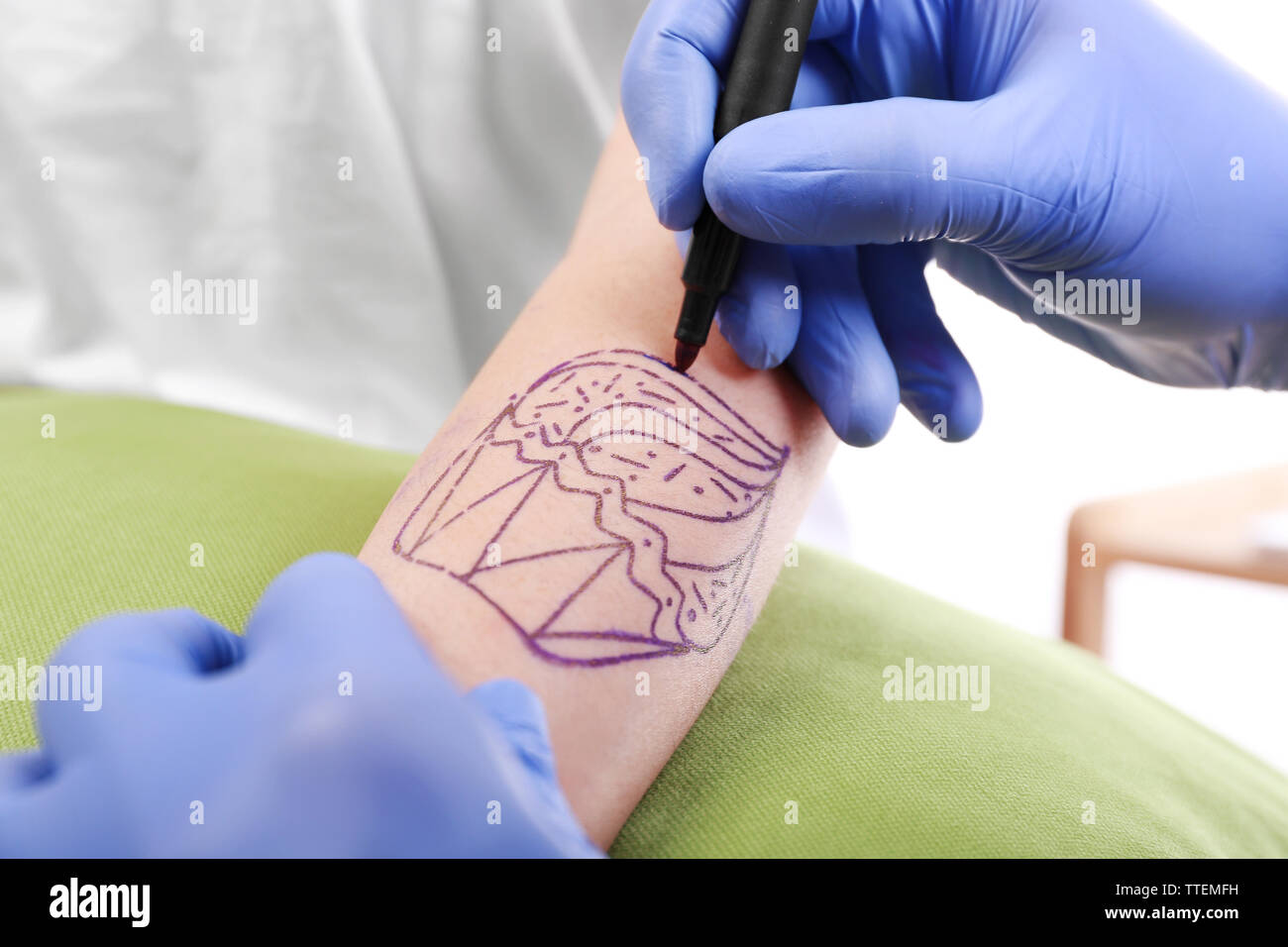 Process of making tattoo, closeup Stock Photo - Alamy
