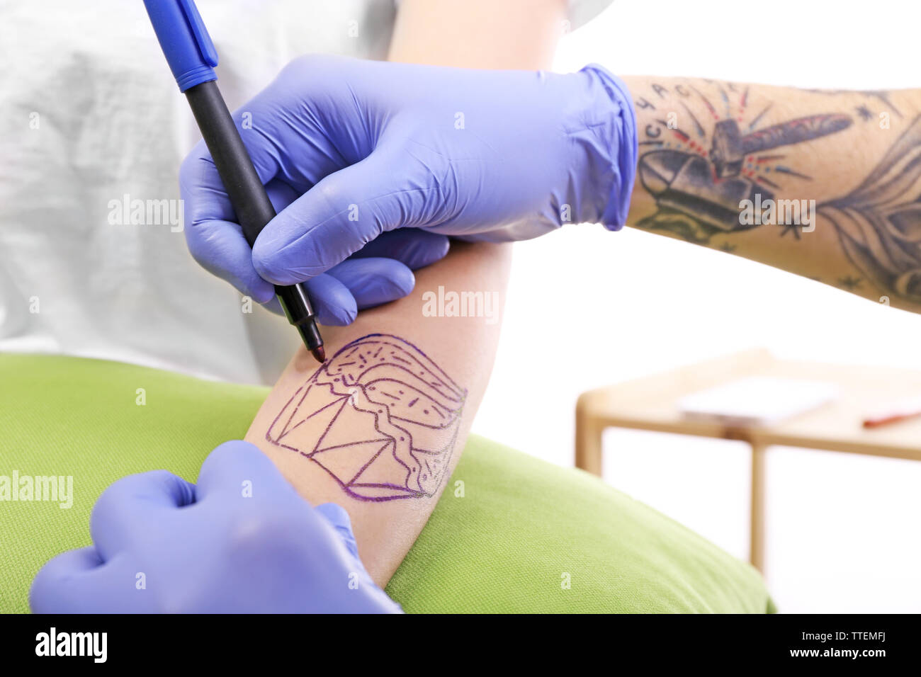 Process of making tattoo, closeup Stock Photo - Alamy