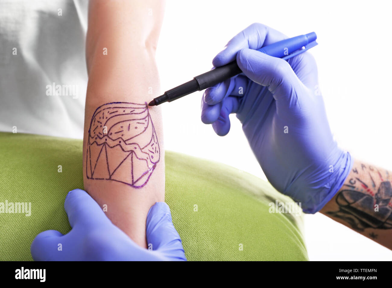 Process of making tattoo, closeup Stock Photo - Alamy