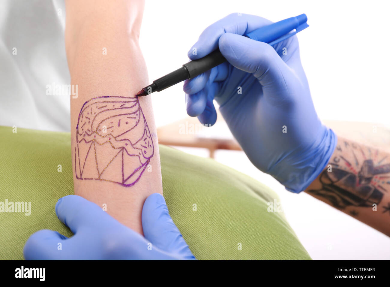 Process of making tattoo, closeup Stock Photo - Alamy