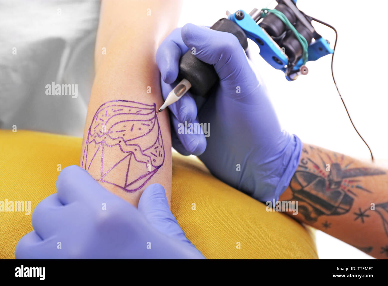 Process of making tattoo, closeup Stock Photo - Alamy