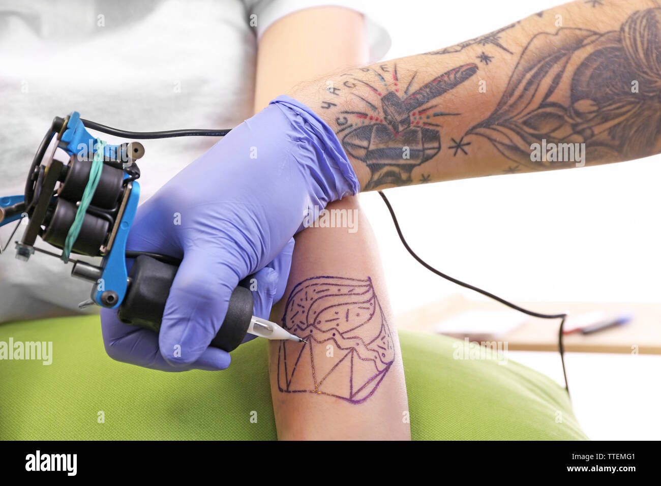 Process of making tattoo, closeup Stock Photo - Alamy