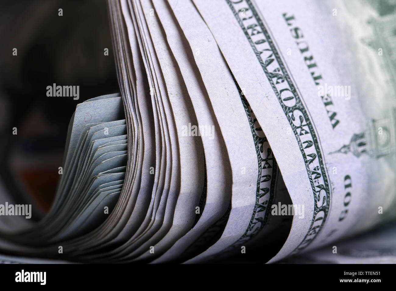 Twisted dollar banknotes, close up Stock Photo - Alamy