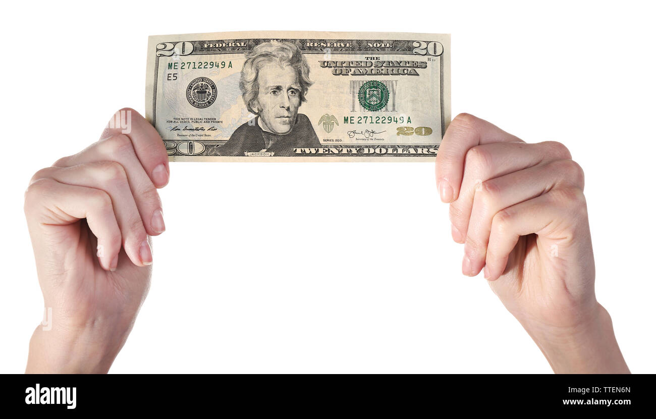 Hands holding twenty dollar banknote, isolated on white Stock Photo - Alamy