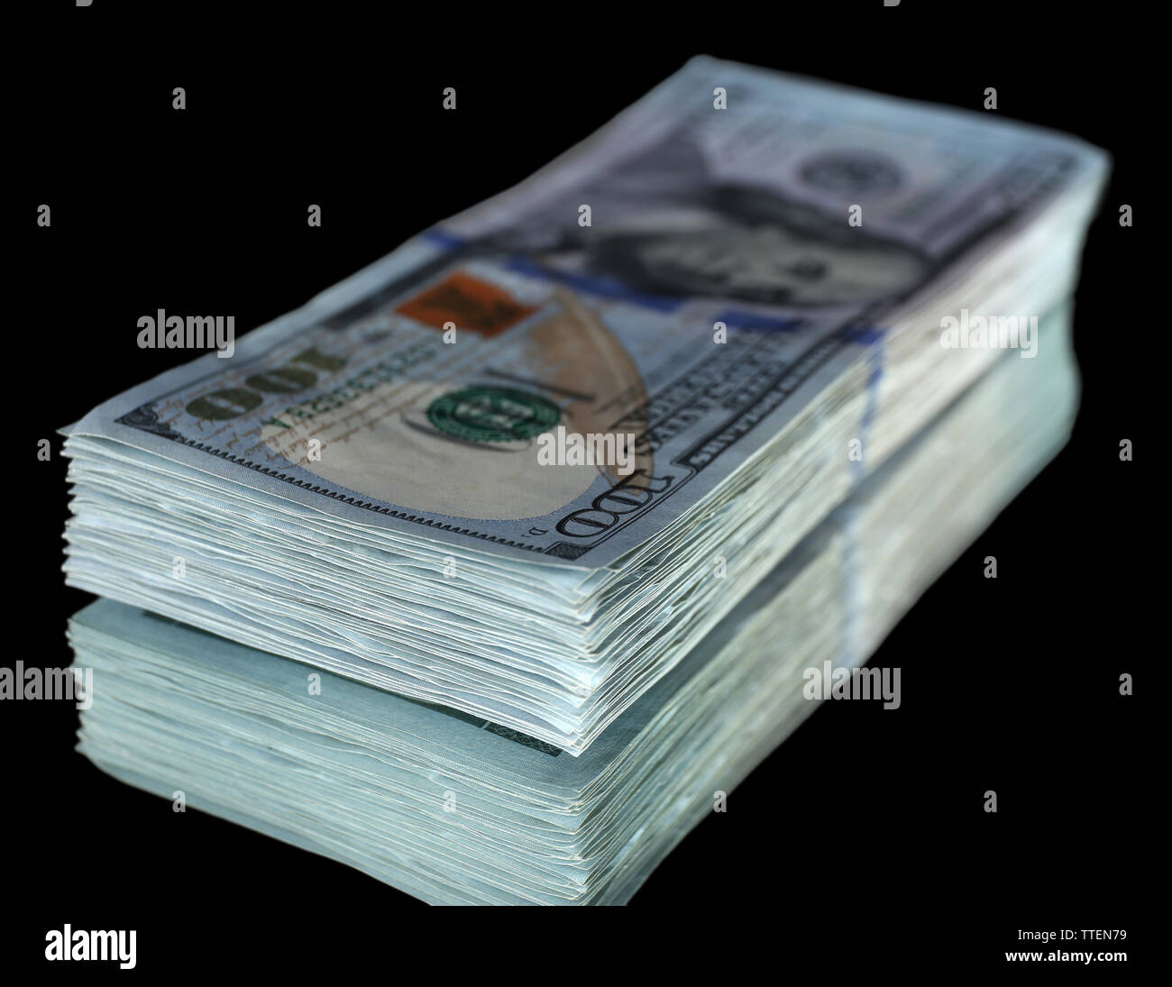 Stack of dollar banknotes on black background Stock Photo - Alamy